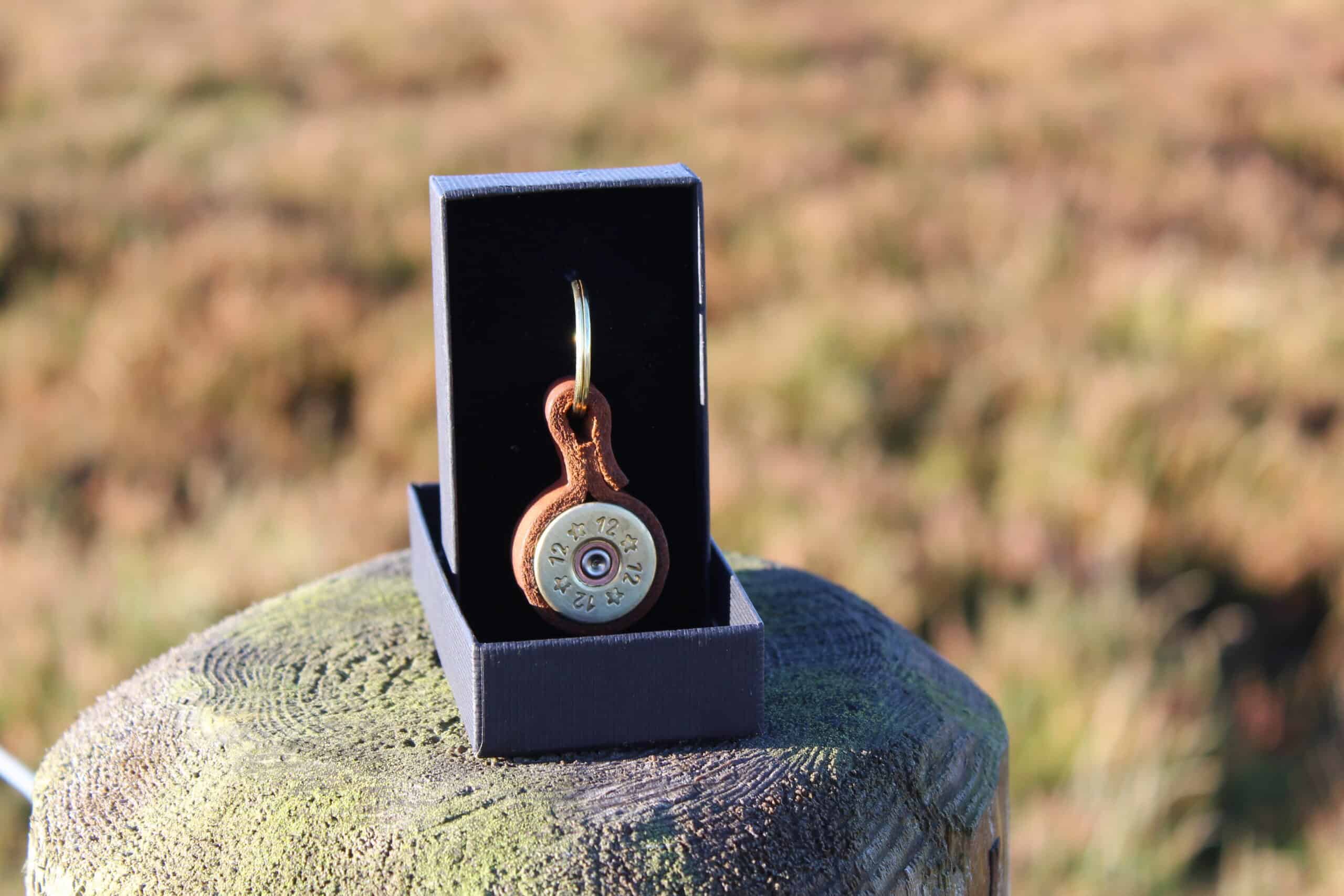 Shotgun cartridge key ring - Boxed brown - Moorland background by Smart ...